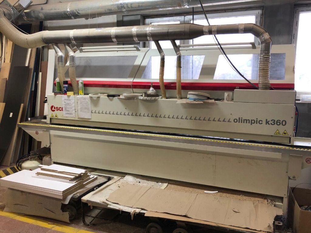 Практически новый автоматический кромкооблицовочный станок с ...